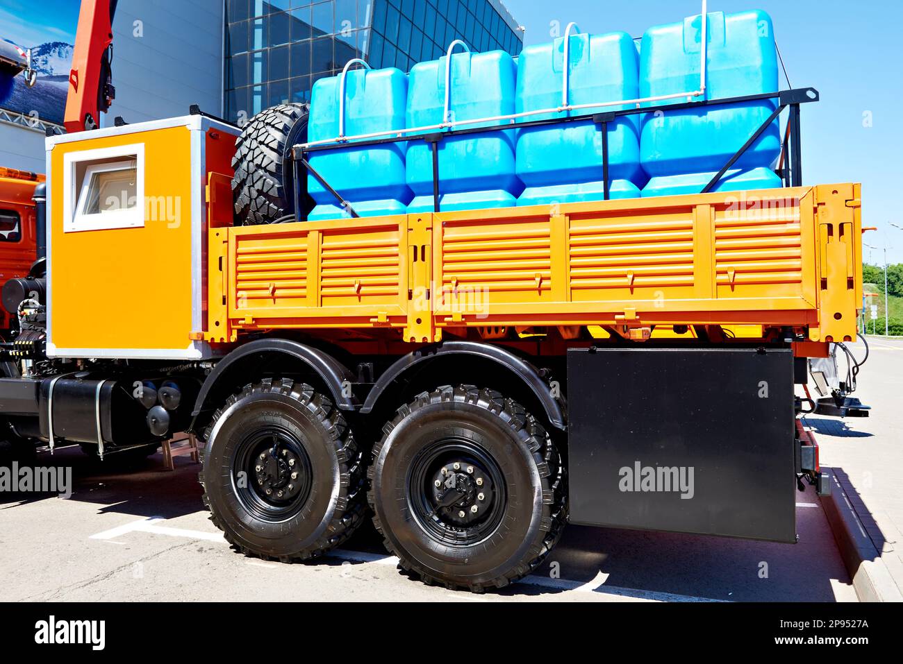 Truck with cans of water Stock Photo - Alamy