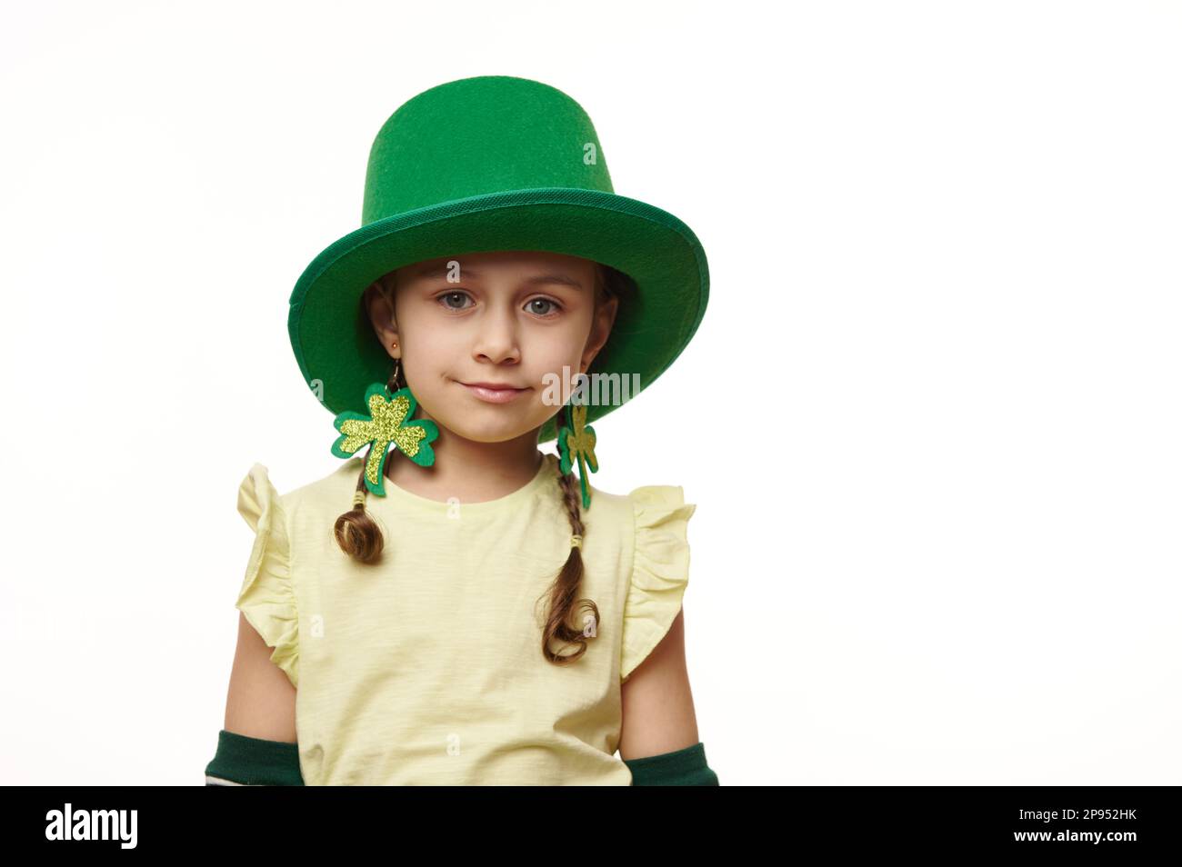 Close-up portrait of smiling Irish little Leprechaun child girl in ...