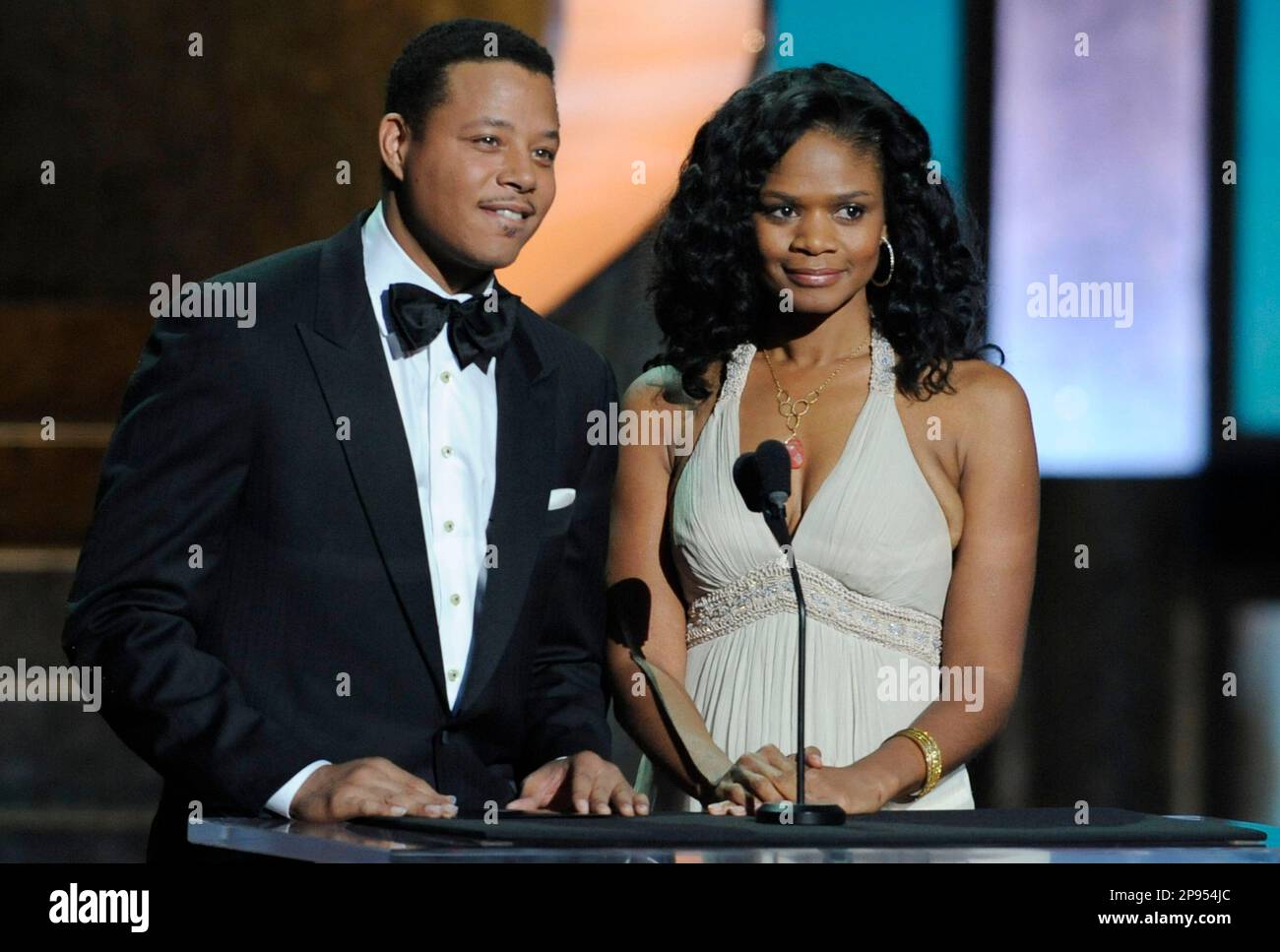 Terrence Howard, left, and Kimberly Elise present the outstanding ...