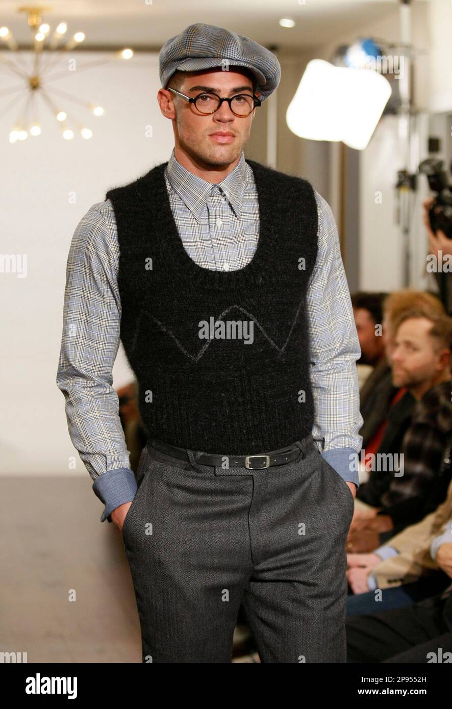 A model walks the runway during the presentation of John Bartlett's ...