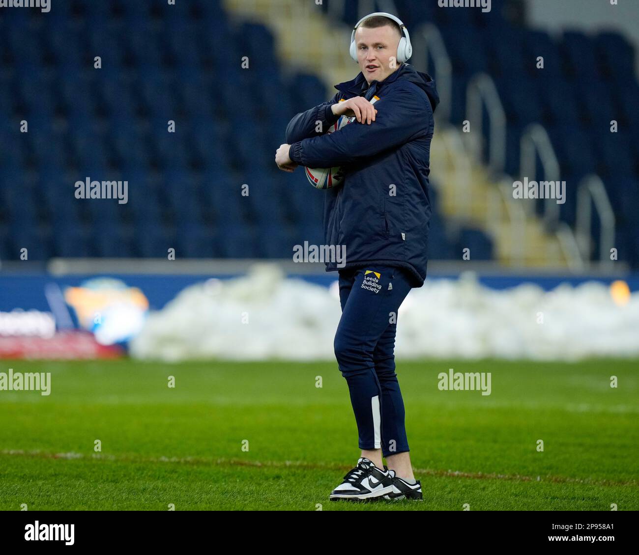 Harry Newman #3 of Leeds Rhinos inspects the pitch before the Betfred ...