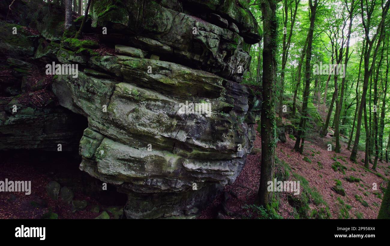 Steep mountain cliff rock formation beautiful carved by erosion. Fresh ...