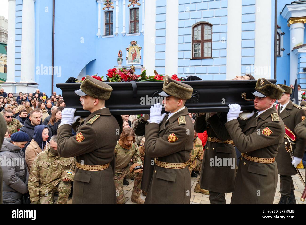 KYIV, UKRAINE - MARCH 10, 2023 - Honour guards carry the coffin out of St Michael's Golden-Domed ...