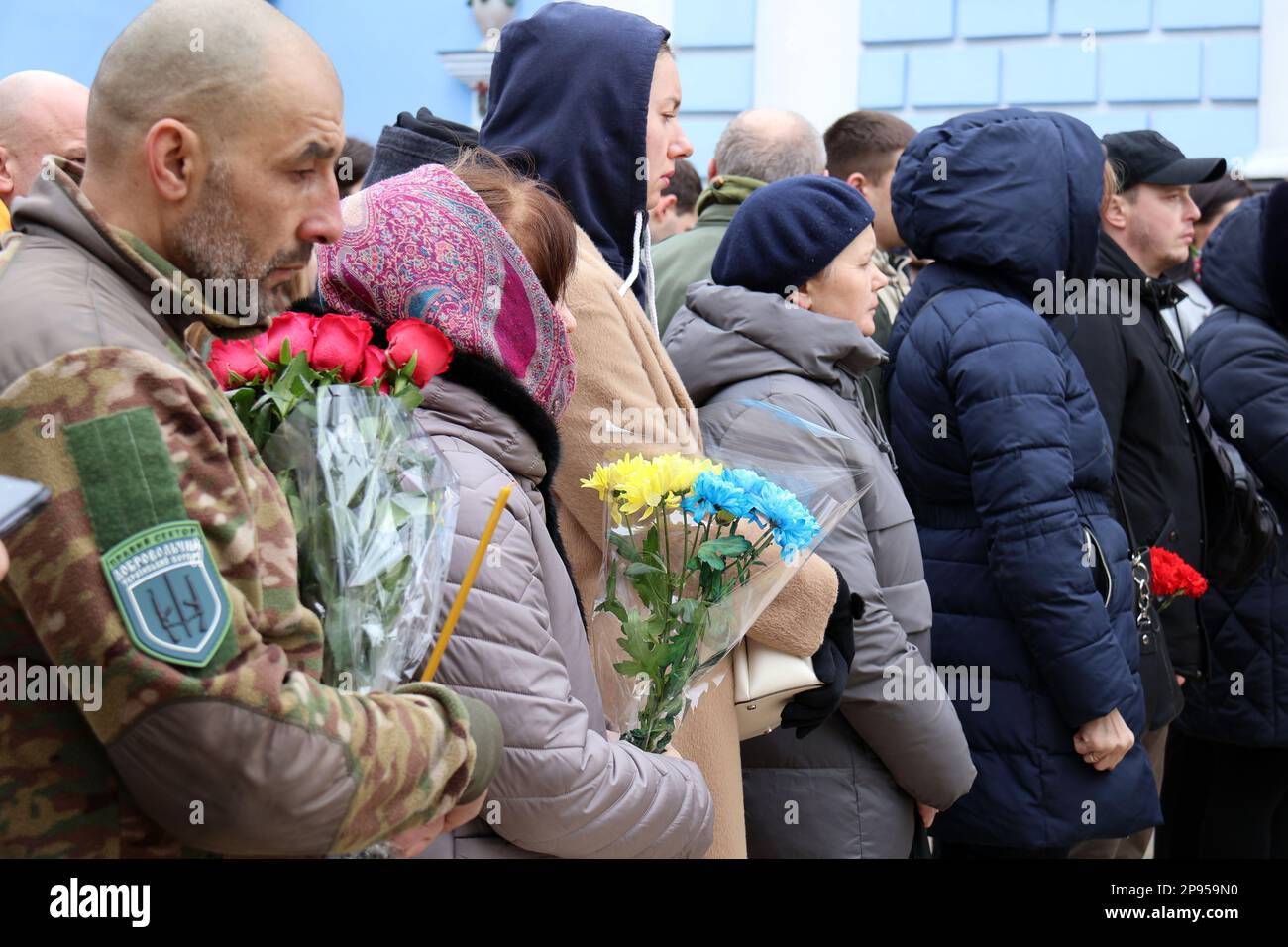 KYIV, UKRAINE - MARCH 10, 2023 - People are gathered outside St Michael's Golden-Domed Cathedral ...