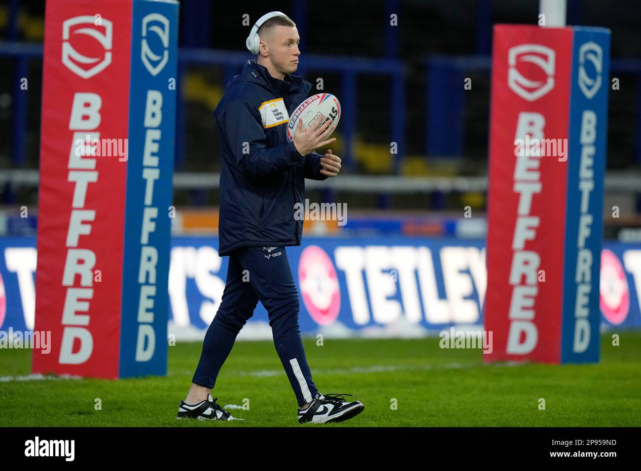 Harry Newman #3 of Leeds Rhinos inspects the pitch before the Betfred ...