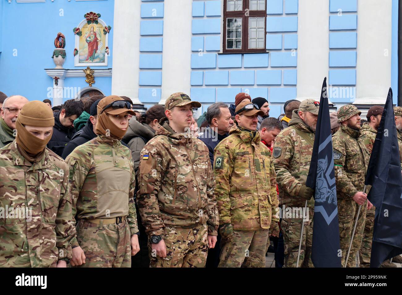 KYIV, UKRAINE - MARCH 10, 2023 - Servicemen line up outside St Michael's Golden-Domed Cathedral ...