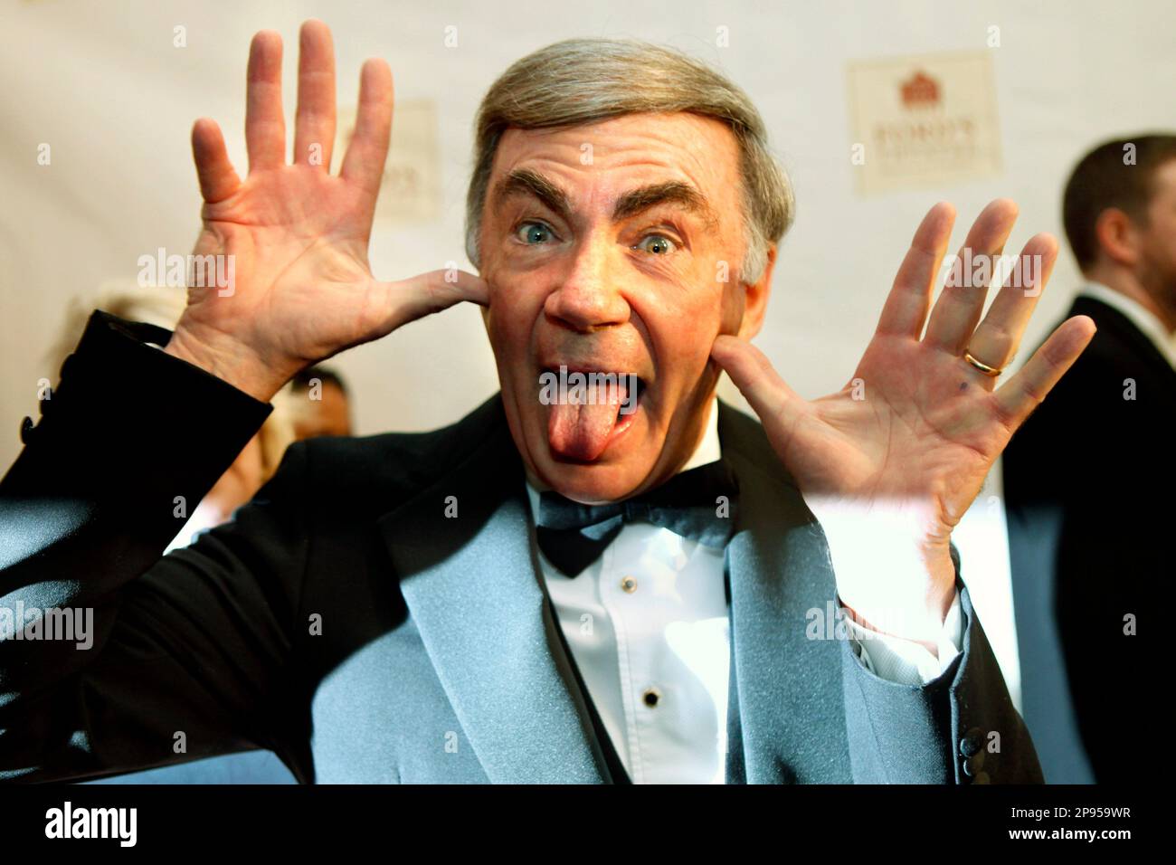 ABC newscaster Sam Donaldson clowns around with the media on the red ...