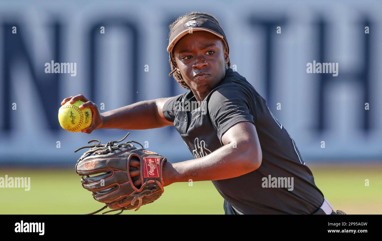 Bethune-Cookman outfielder Shania Owens (27) warms up before an NCAA ...