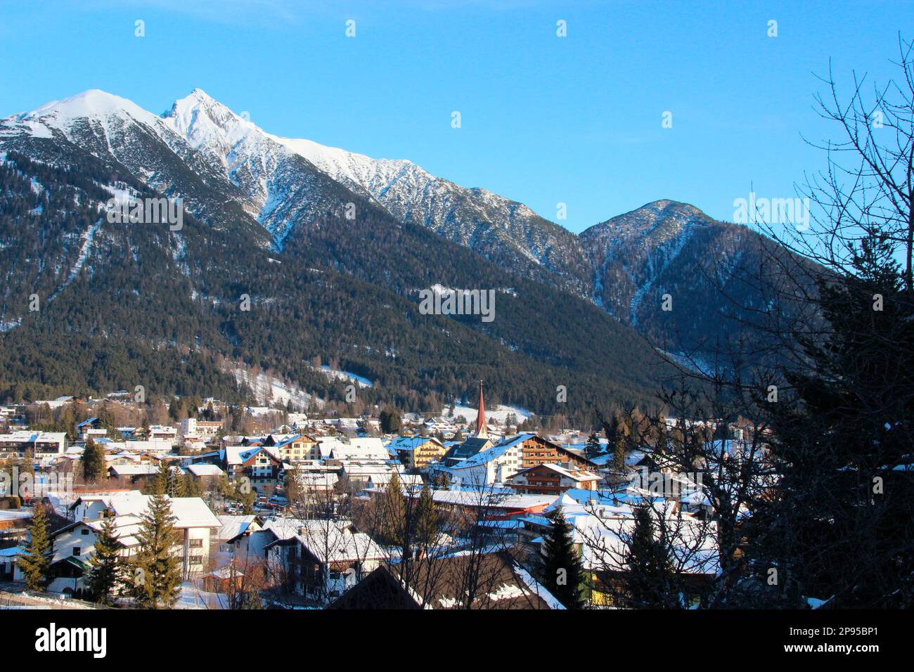Austria, Tyrol, Seefeld, village view, winter mountain landscape ...