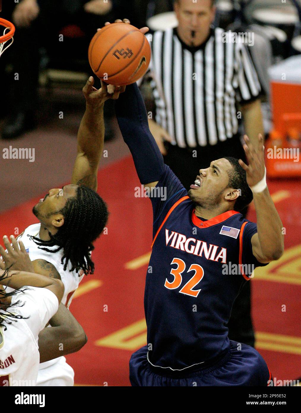 Virginia's Mike Scott, right, pulls down a second-half rebound over ...