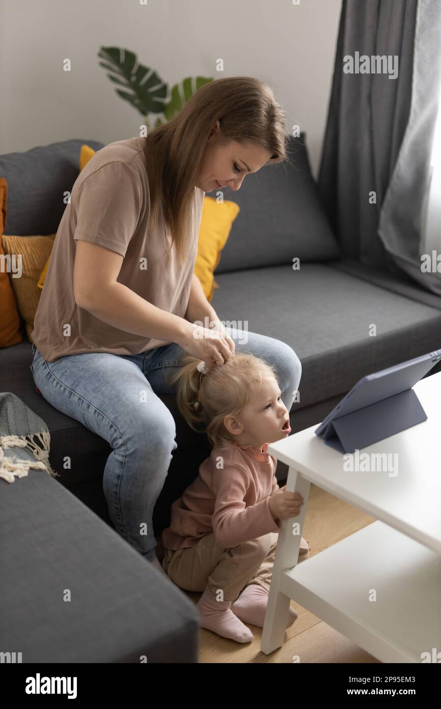 Deaf child girl with cochlear implant studying to hear sounds ...