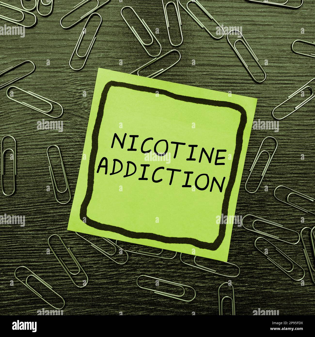 Text caption presenting Nicotine Addiction. Conceptual photo condition ...