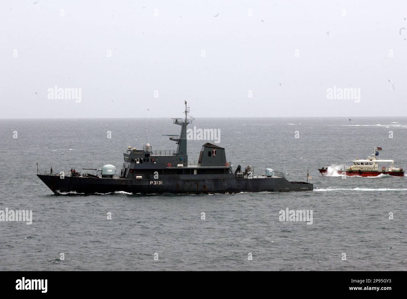 Kenyan Navy gun boat patrols the sea off the coast of Mombasa, Kenya ...