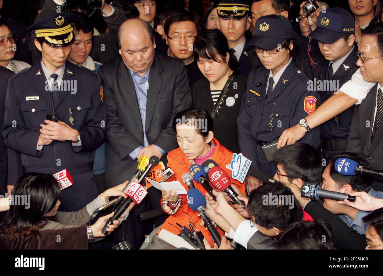 Taiwan's wheelchair-bound former first lady Wu Shu-chen speaks to media after pleading guilty to ...