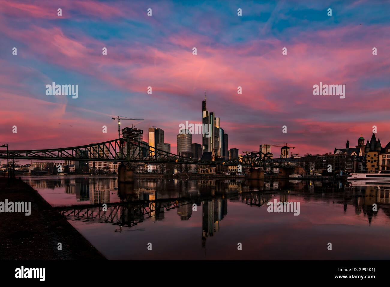 View over the river Main to the skyline of Frankfurt am Main. Sunset ...