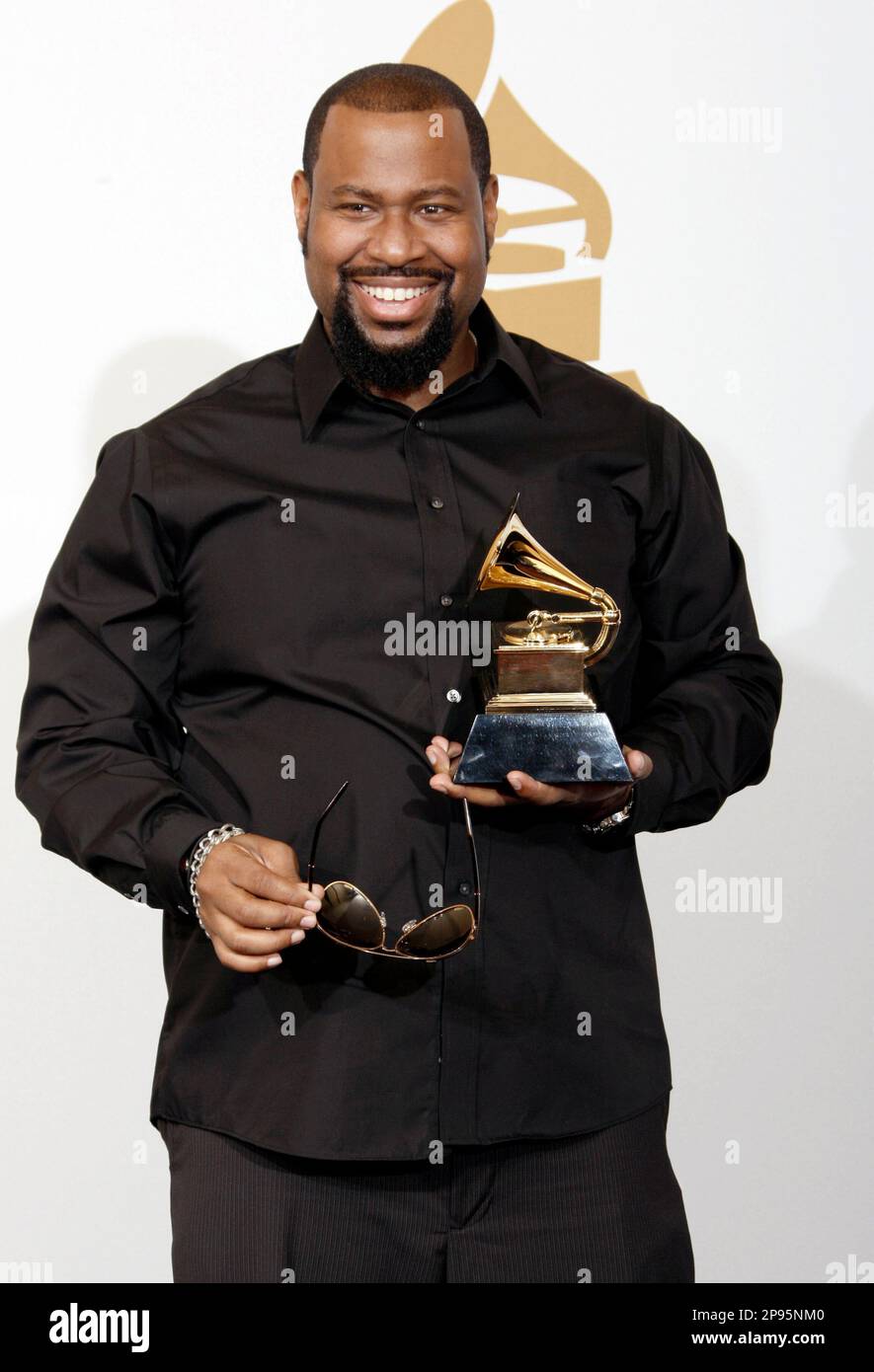 Darius Harrison holds the best rap song award for "Lollipop" backstage ...