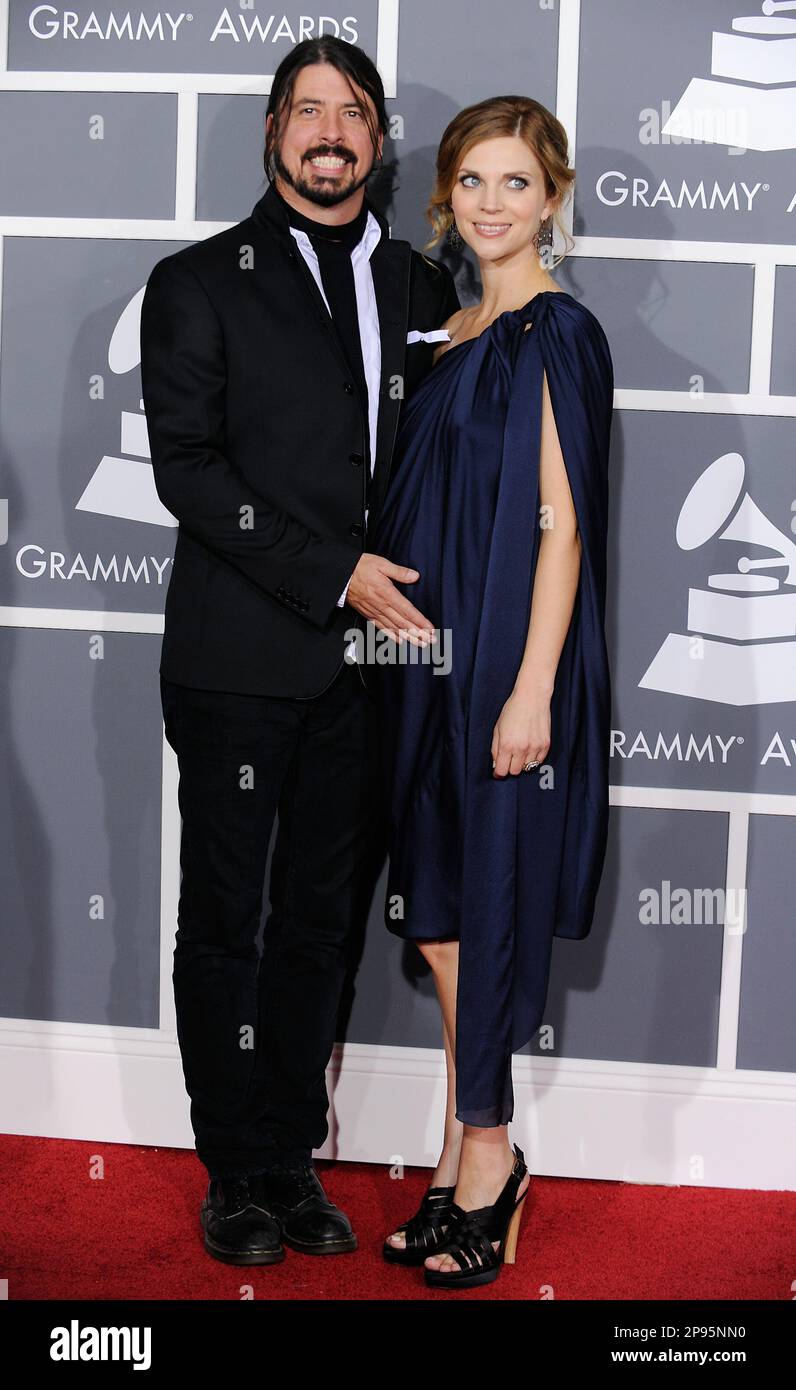 Dave Grohl, left, and wife Jordyn Blum arrive at the 51st Annual Grammy ...