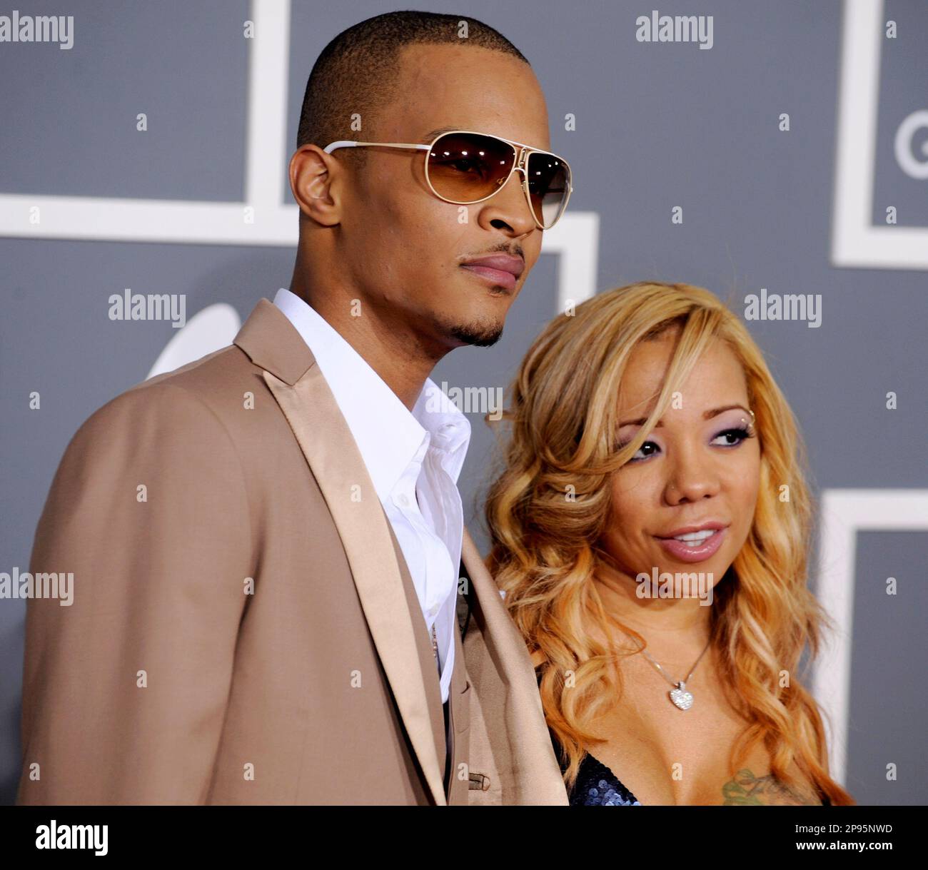 T.I., left, and Tiny arrive at the 51st Annual Grammy Awards on Sunday ...