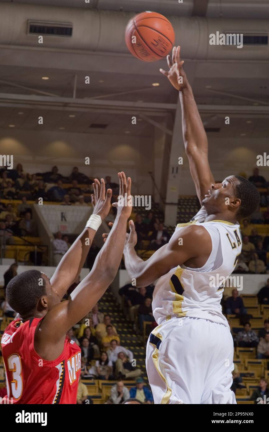 Georgia Tech forward Gani Lawal (31) shoots over Maryland forward Dino ...