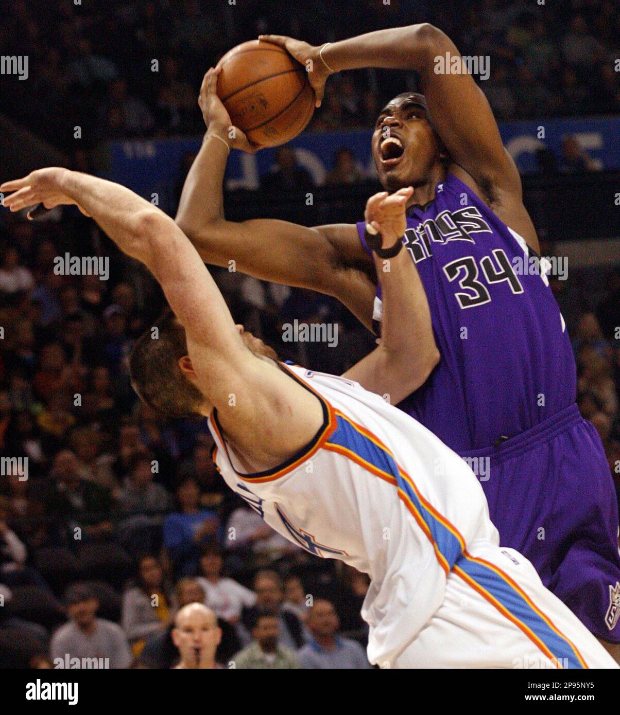 Sacramento Kings forward Jason Thompson, right, is fouled by Oklahoma ...