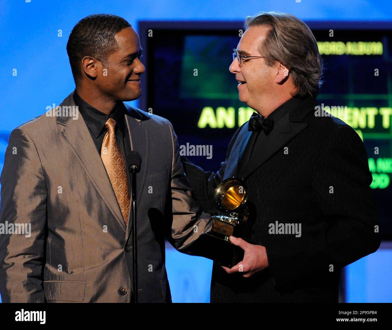 Blair Underwood, left, and Beau Bridges accept the award for best ...