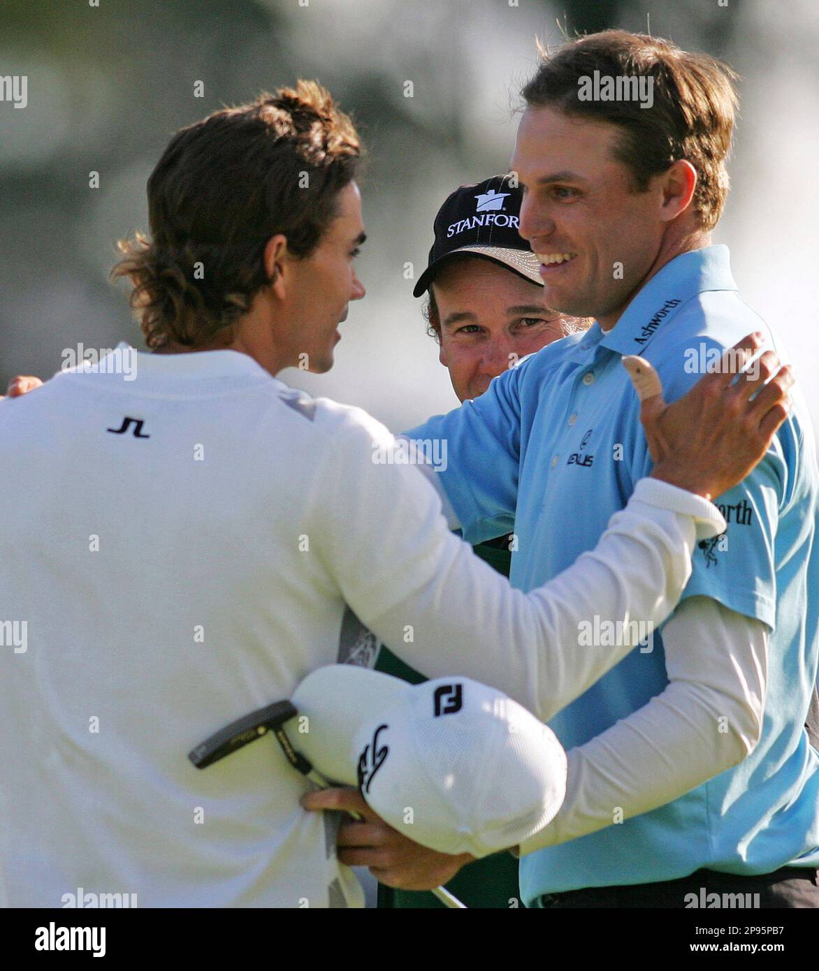 Nick Watney, right, is congratulated by Camilo Villegas after Watney's ...