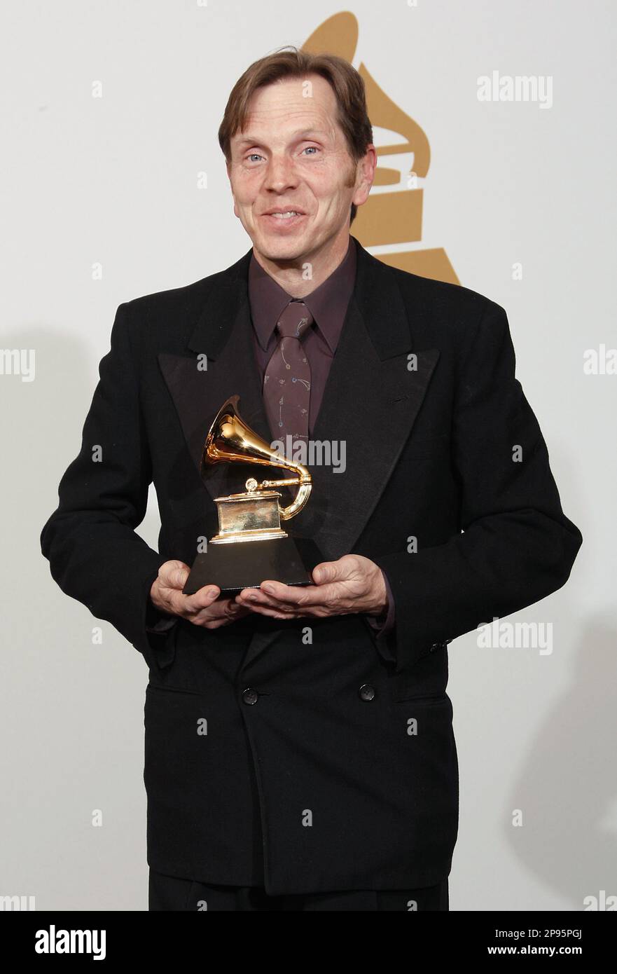 Tom Wasinger poses backstage with his award for Best native American ...