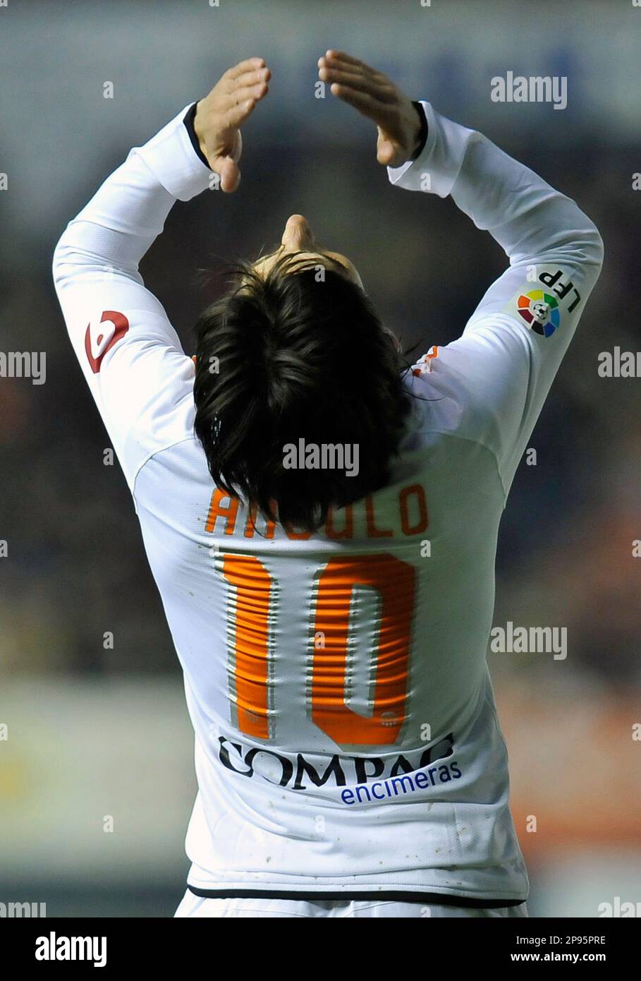 Valencia player Miguel Angulo reacts after missing a goal, against ...