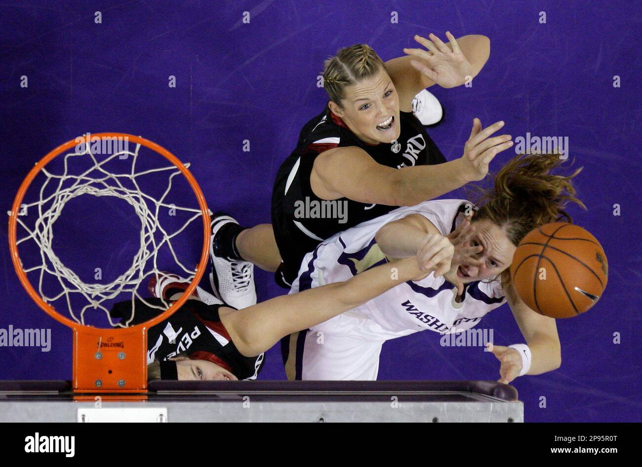Washington's Laura McLellan, right, is double-teamed Stanford's Kayla ...