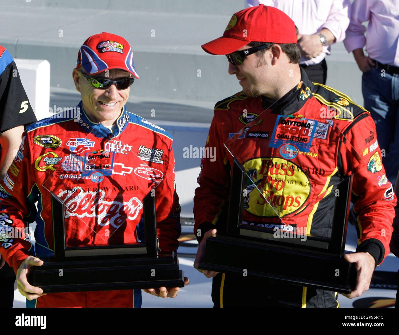 Mark Martin, left, and Martin Truex Jr. joke around in victory lane ...