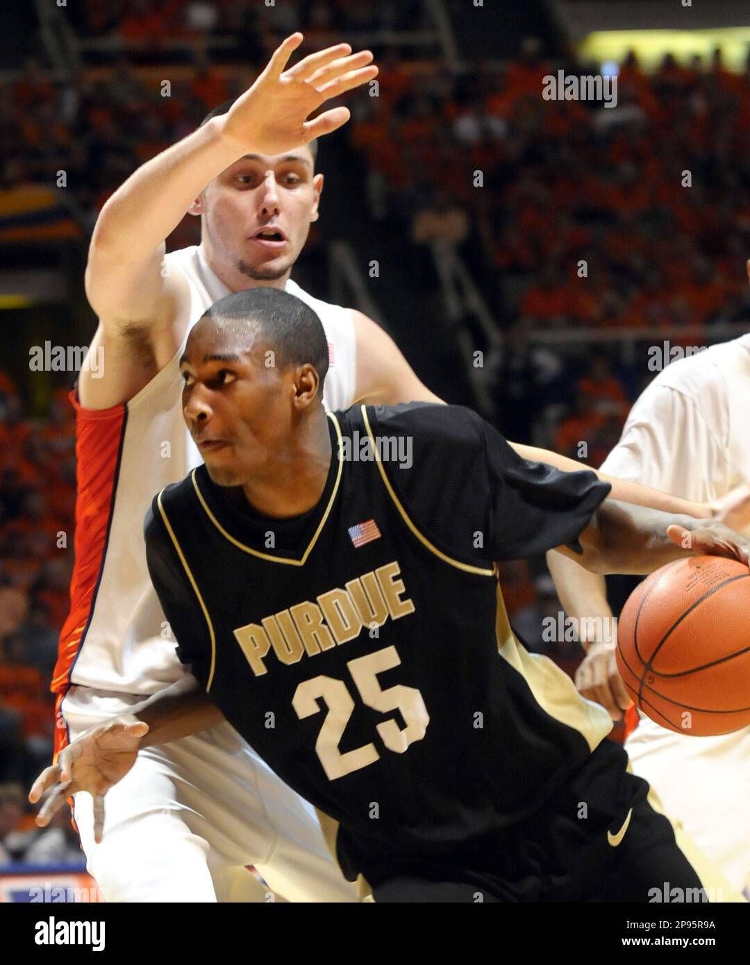 Purdue's JaJuan Johnson (25) drives to the basket against Illinois ...