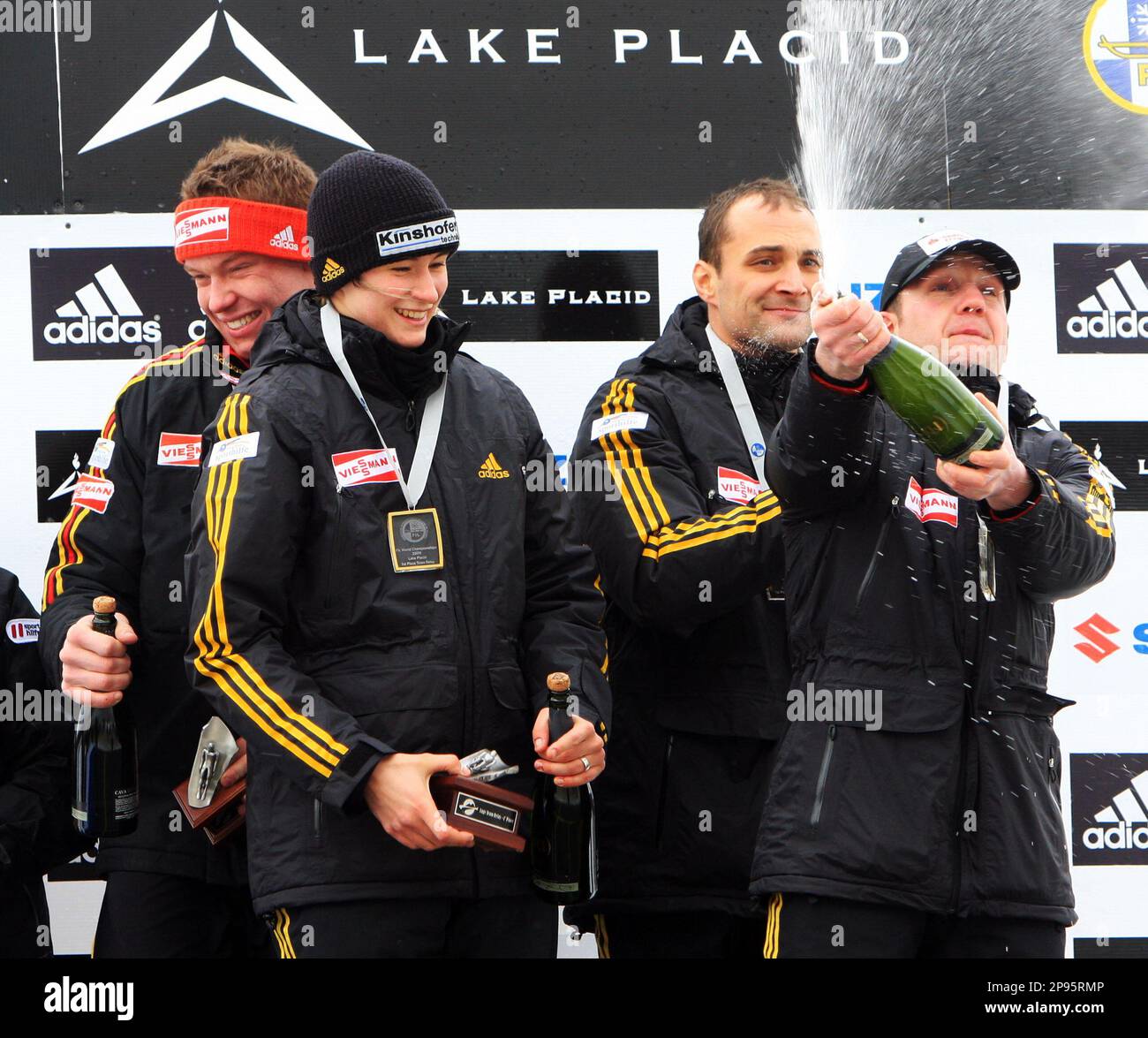 The German relay team celebrates after receiving the gold medal at the ...