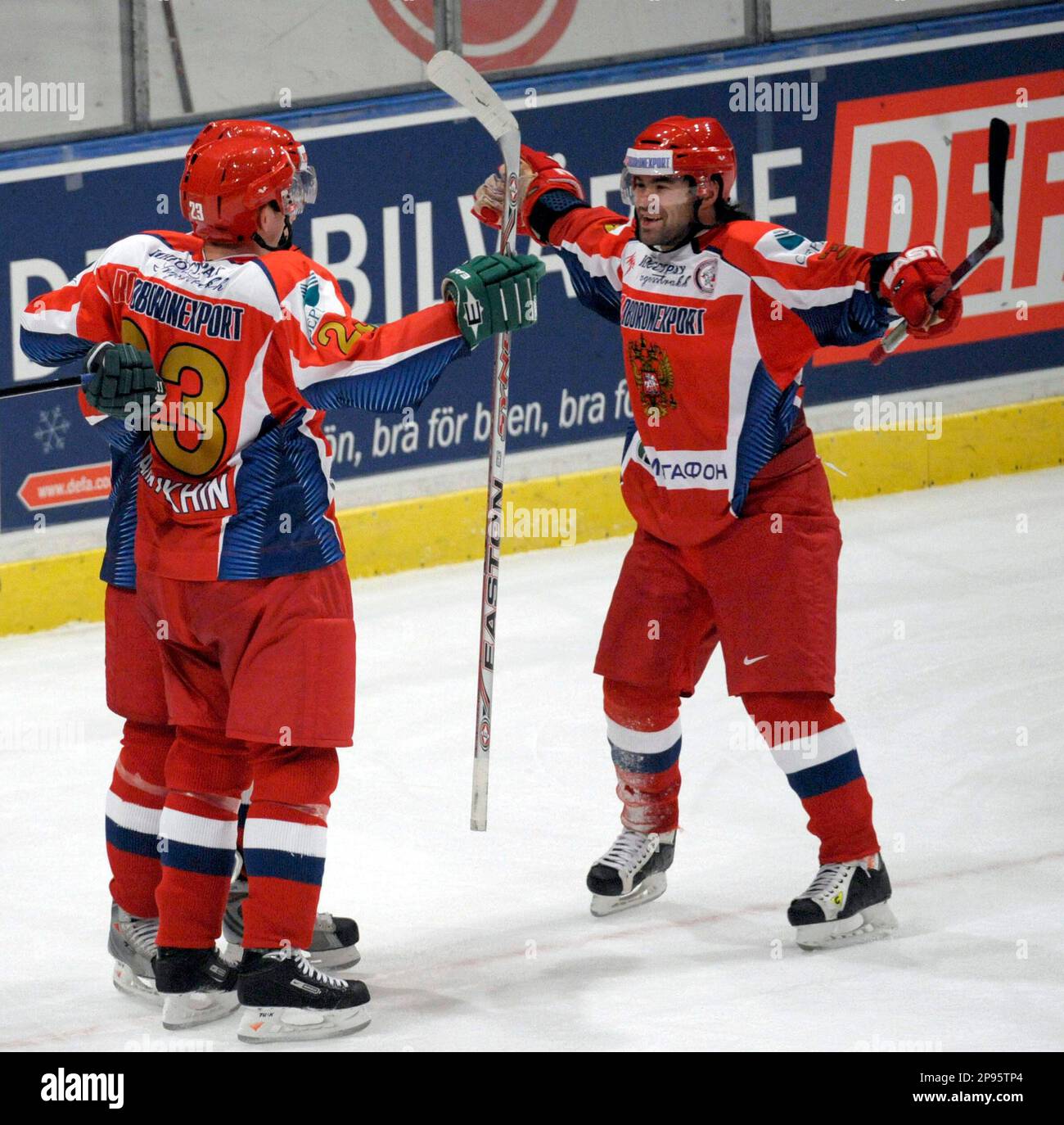 Russia's Andrey Taratukhin, left, and Maxim Rybin celebrate during their match against the Czech ...