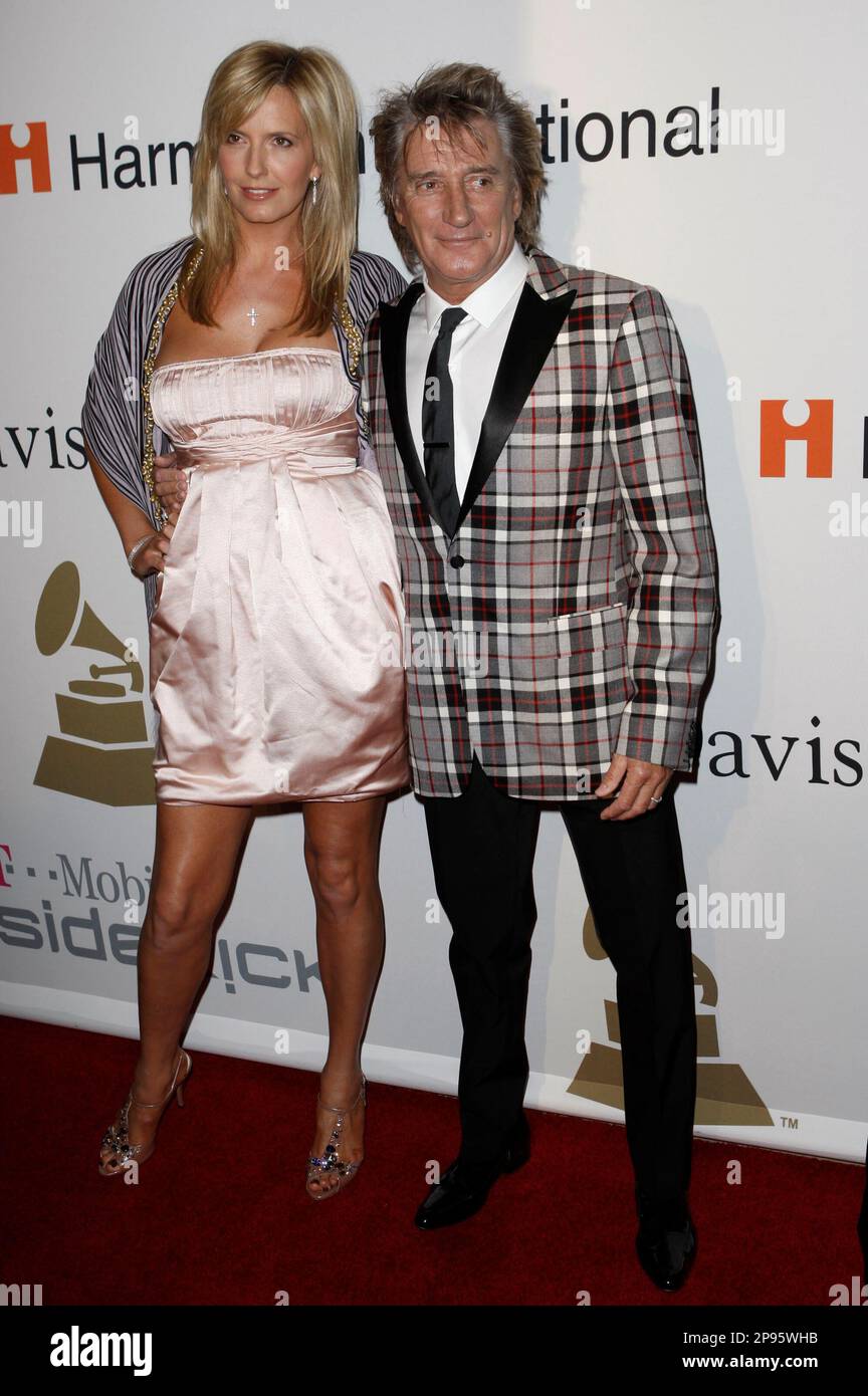 Musician Rod Stewart, right, and Penny Lancaster arrive at the Clive ...