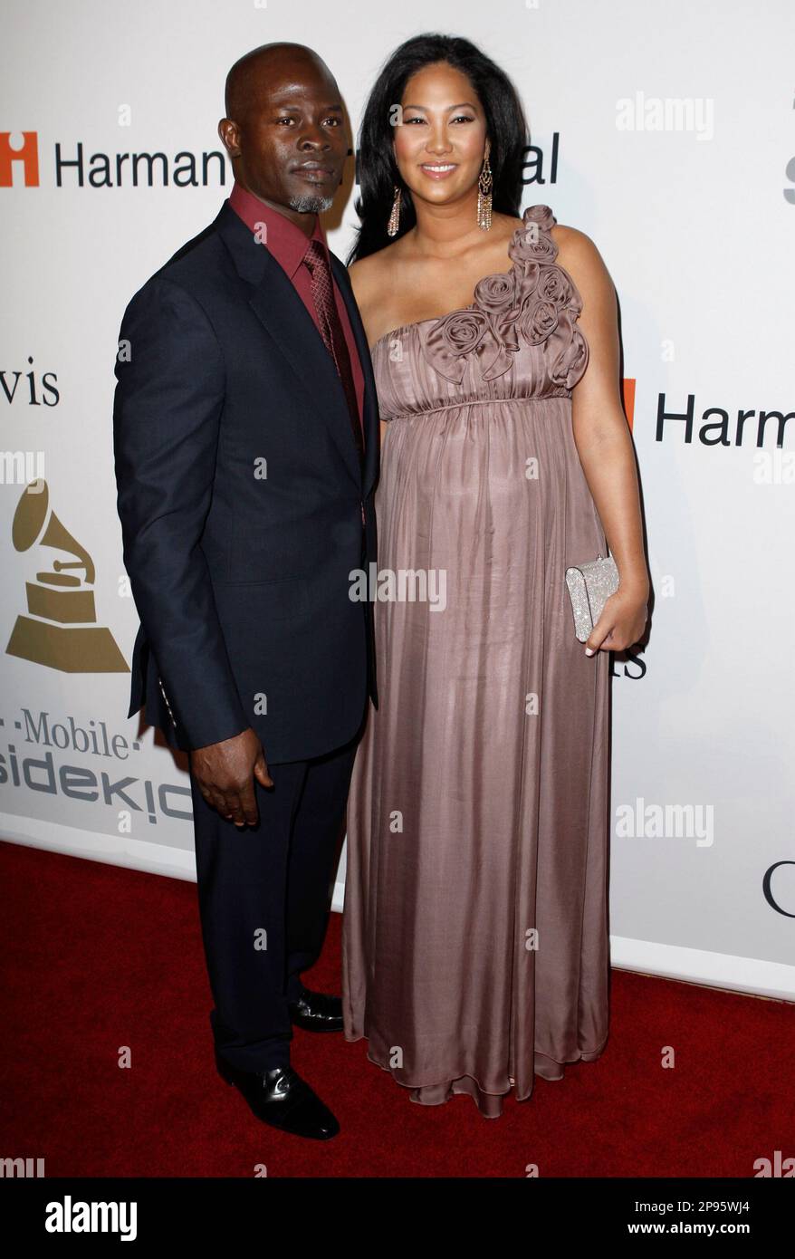 Kimora Lee, right, and Djimon Hounsou arrive at the Clive Davis pre ...