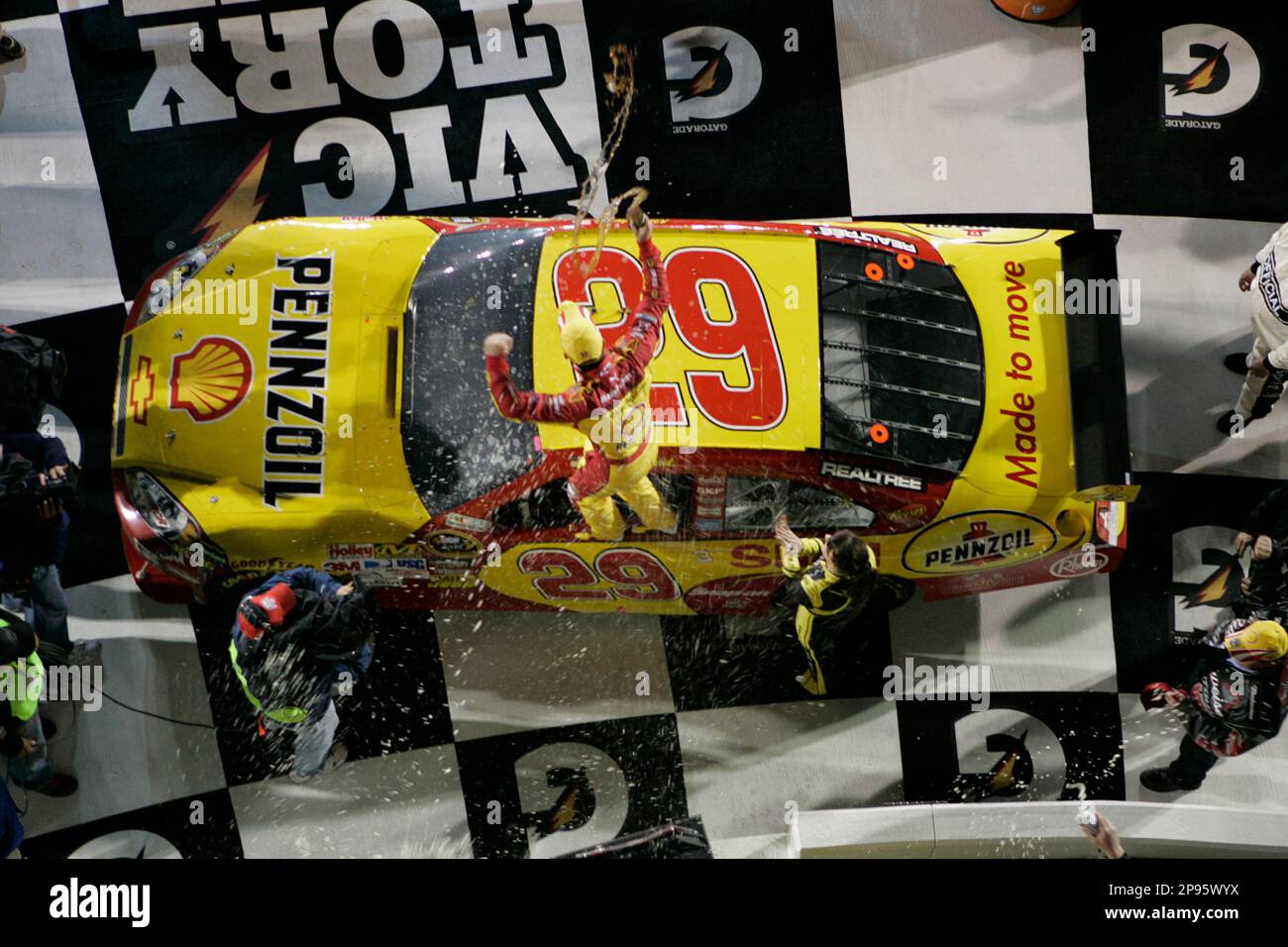 NASCAR driver Kevin Harvick celebrates after winning the NASCAR Bud ...