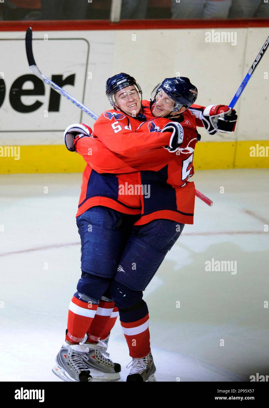 Washington Capitals' Mike Green, left, celebrates his second goal of ...
