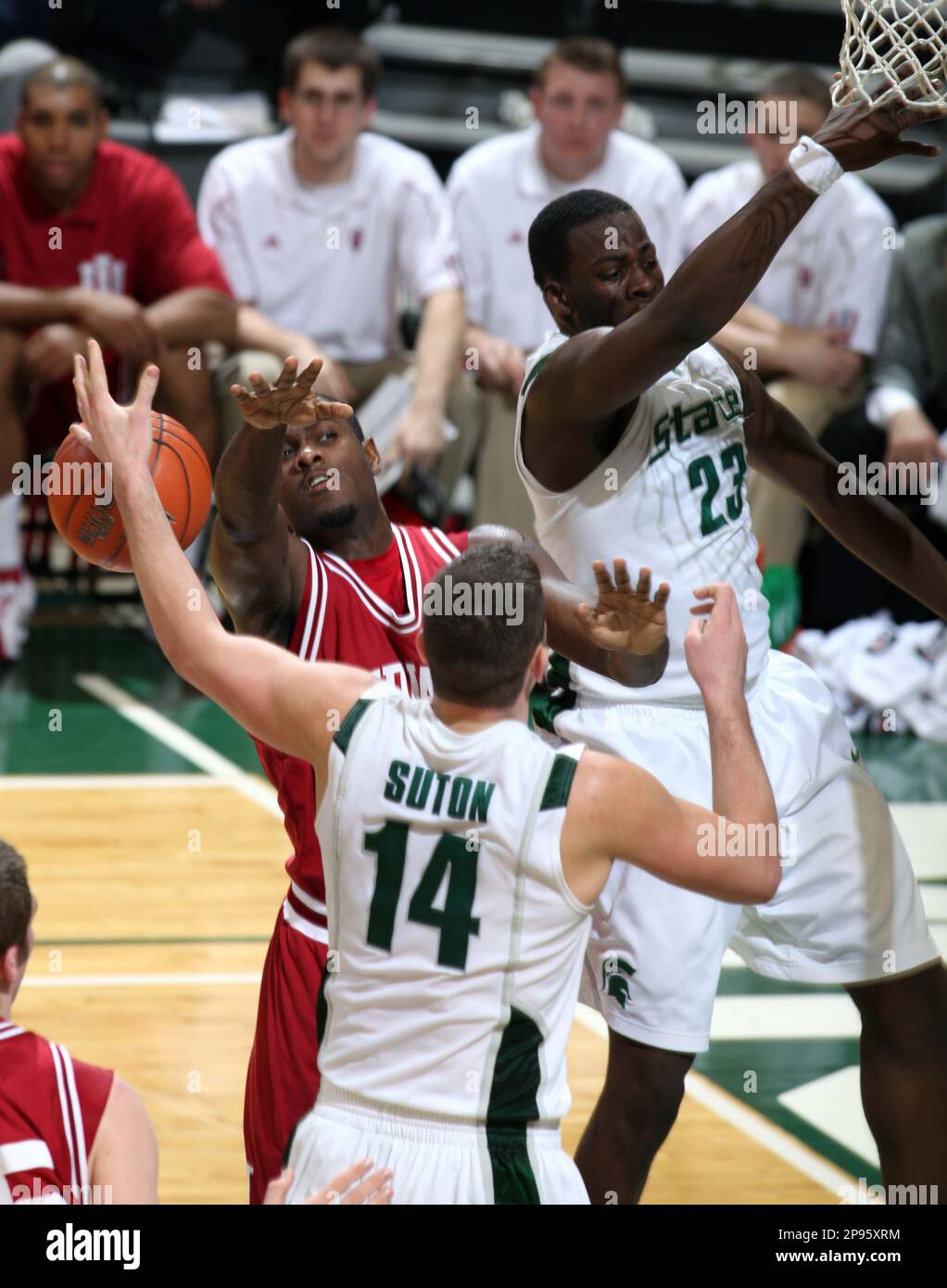 Michigan State's Goran Suton (14) and Draymond Green (23) and Indiana's ...