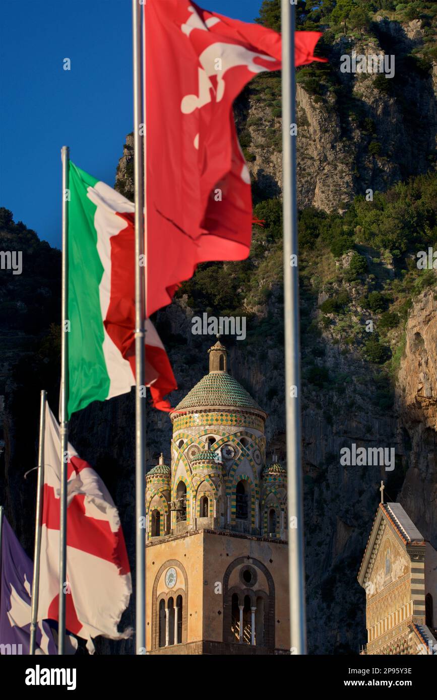 Flags on the jetty and Belltower of the Duomo di Sant Andrea (St Andrew ...