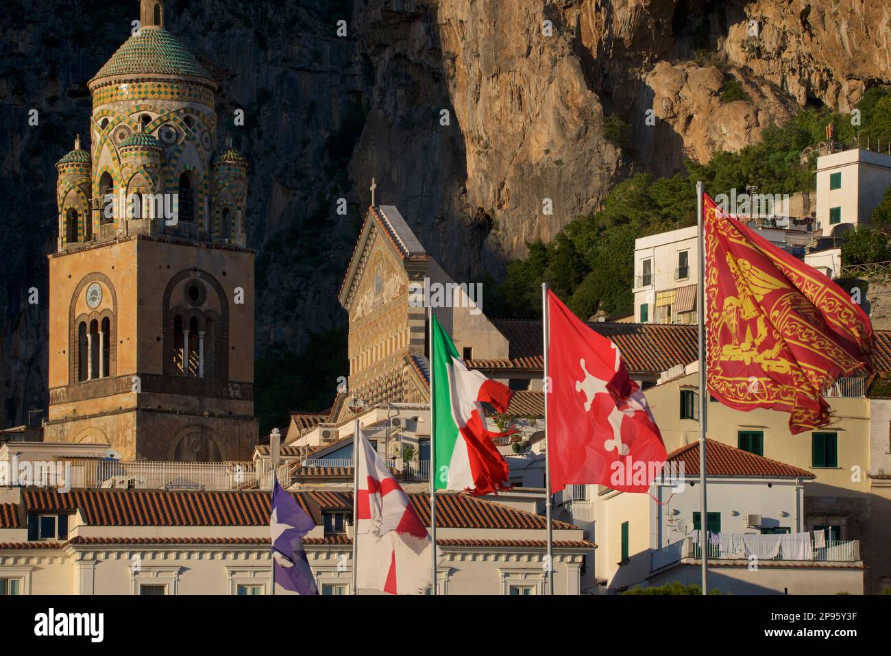 Flags on the jetty and Belltower of the Duomo di Sant Andrea (St Andrew ...