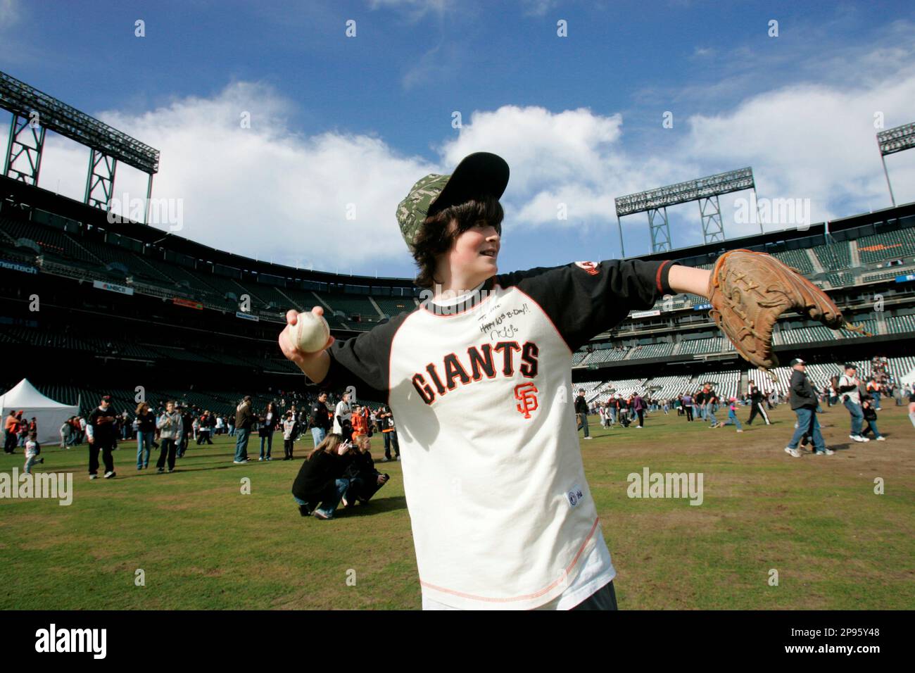 Nate Bechtel, 12, of Petaluma, Calif., plays catch with a friend on the ...