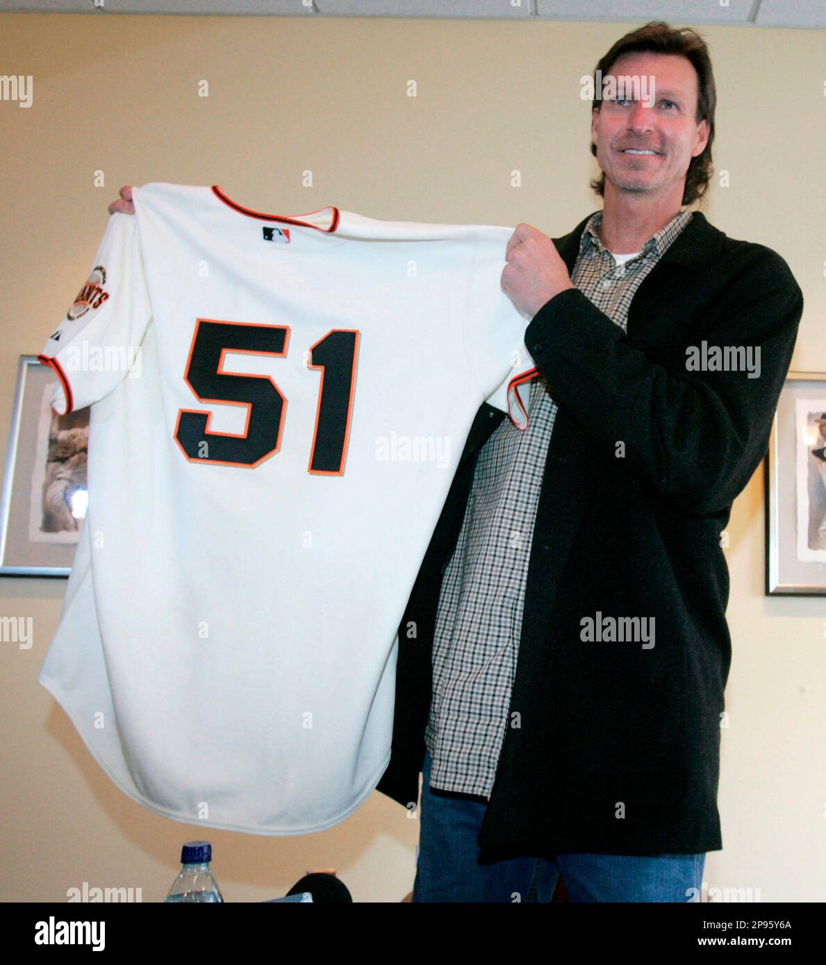 San Francisco Giants pitcher Randy Johnson poses for photos during an ...