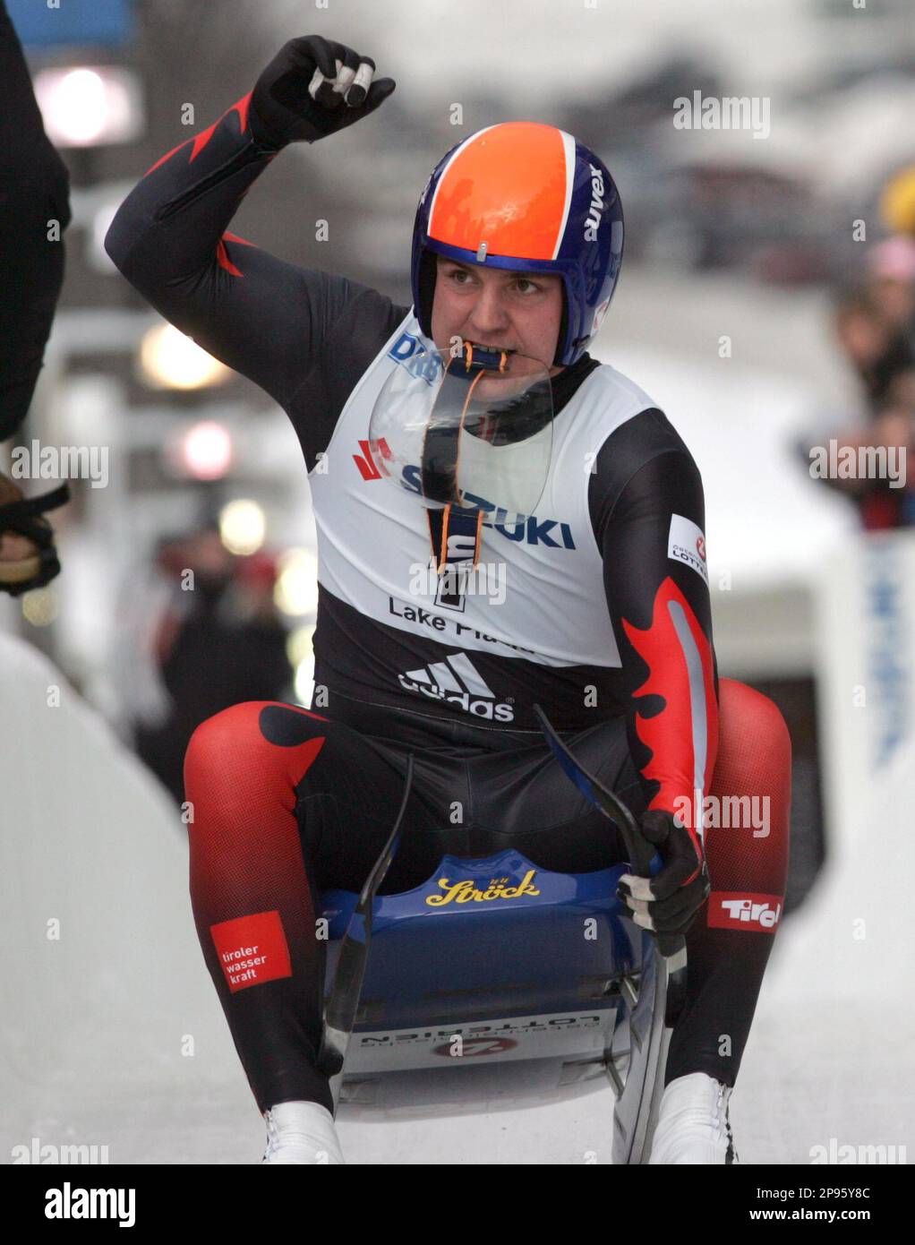 Austria's Daniel Pfister celebrates after crossing the finish line ...