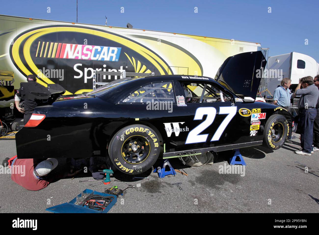 NASCAR driver Kirk Shelmerdine's crew works on his car during practice ...