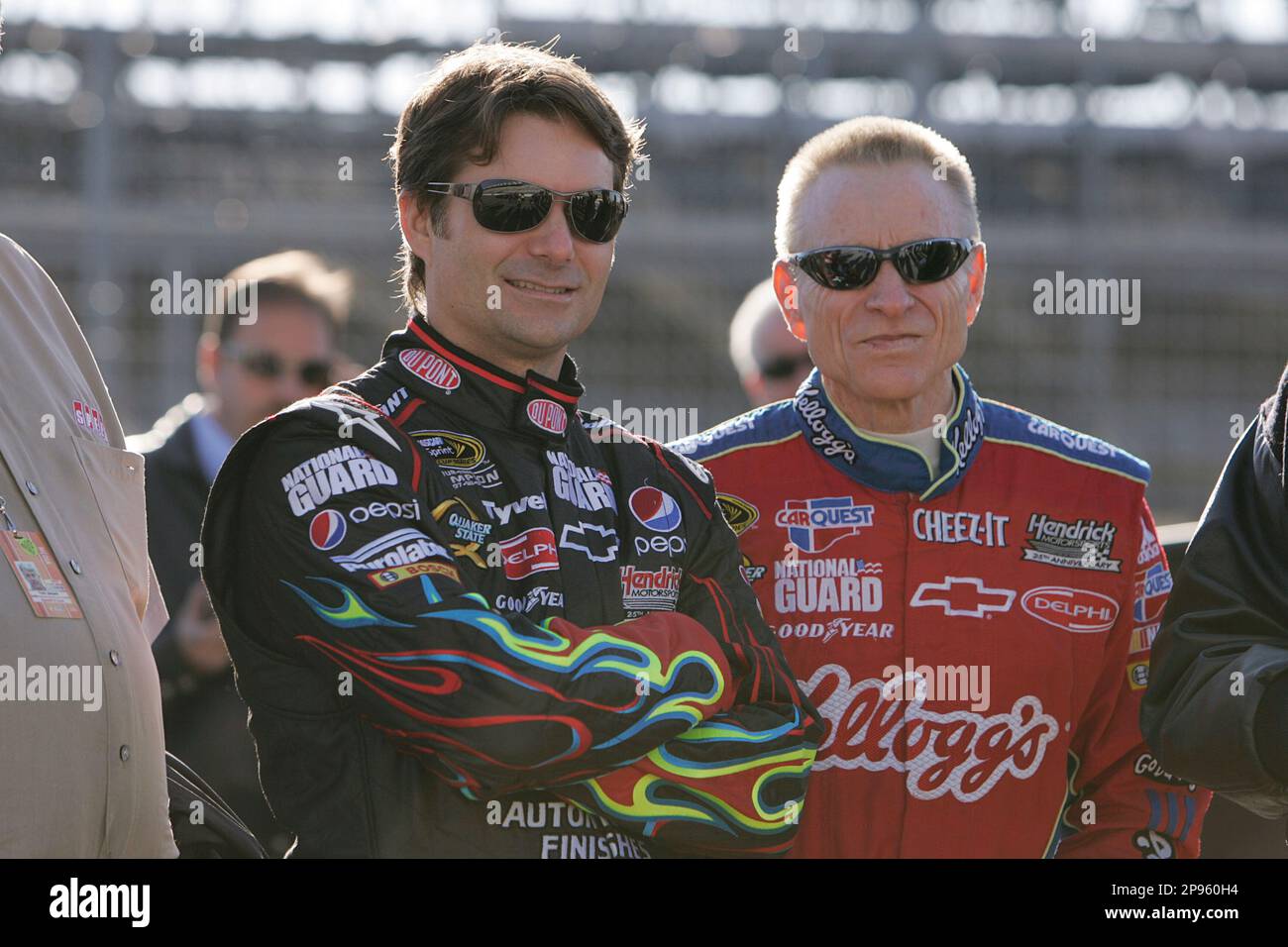 NASCAR drivers Jeff Gordon and Mark Martin talk during the ceremony to ...