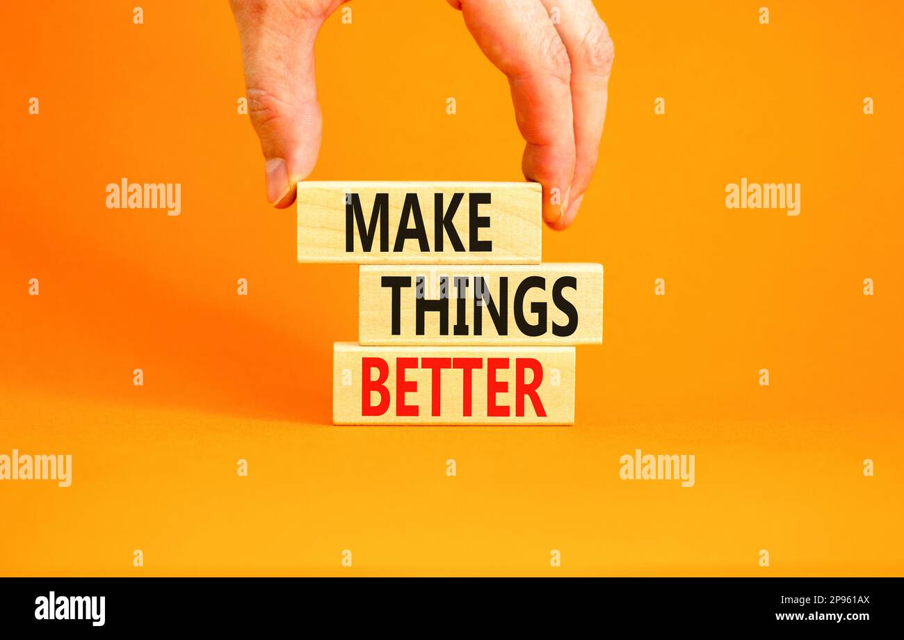 Make things better symbol. Concept words Make things better on wooden ...