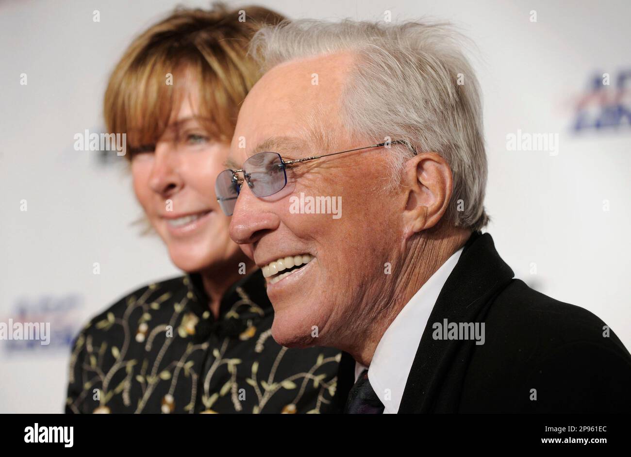 Andy Williams and his wife Debbie Haas arrive at the MusiCares Person ...