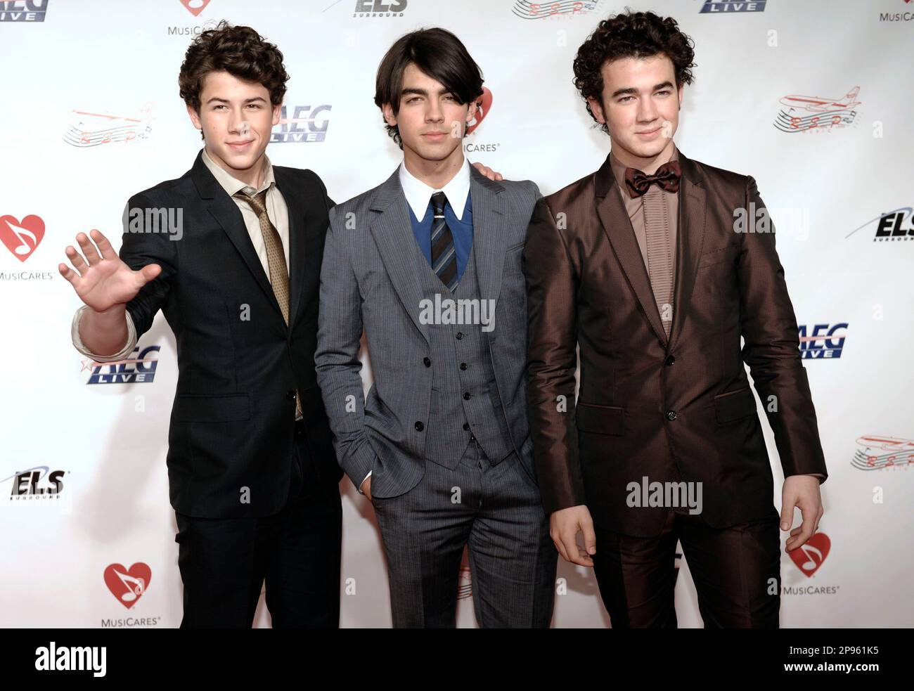 The Jonas Brothers, from left, Kevin, Joe and Nick arrive at the ...