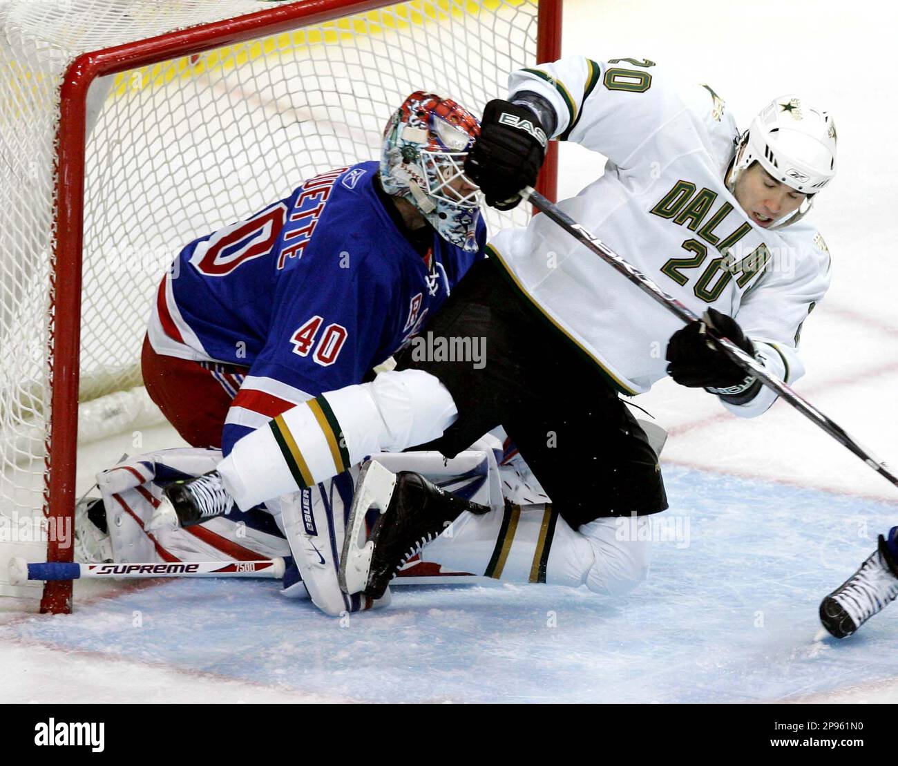 Dallas Stars center Brian Sutherby (20) collides with New York Rangers ...