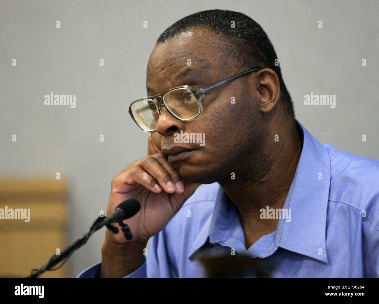 Texas inmate Jerry Wayne Johnson sits in the witness box and listens ...
